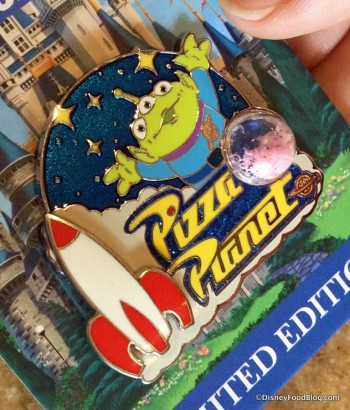 Own A Piece Of Toy Story Pizza Planet With This Pin The Disney Food Blog